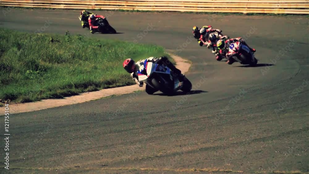 Motorcycle racing HD slow motion static video. Moto riders in turn on ...