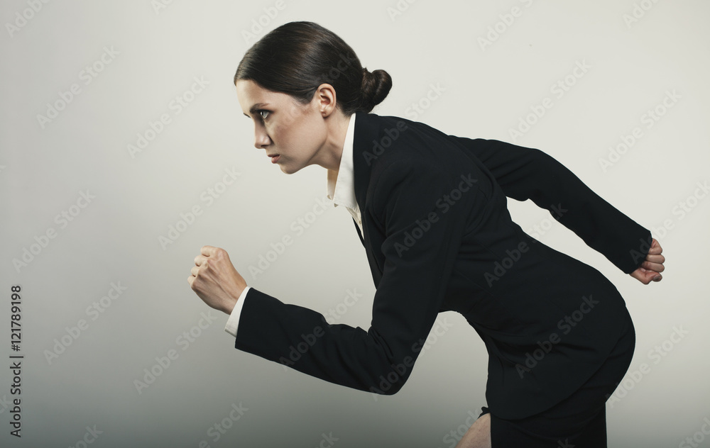 Beautiful young businesswomen passing run isolated Stock Photo | Adobe ...