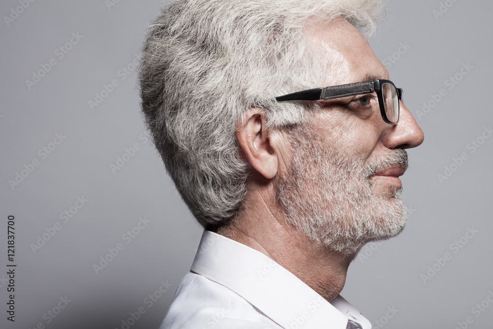 Eyewear concept. Profile portrait of 60-year-old man posing Stock Photo ...