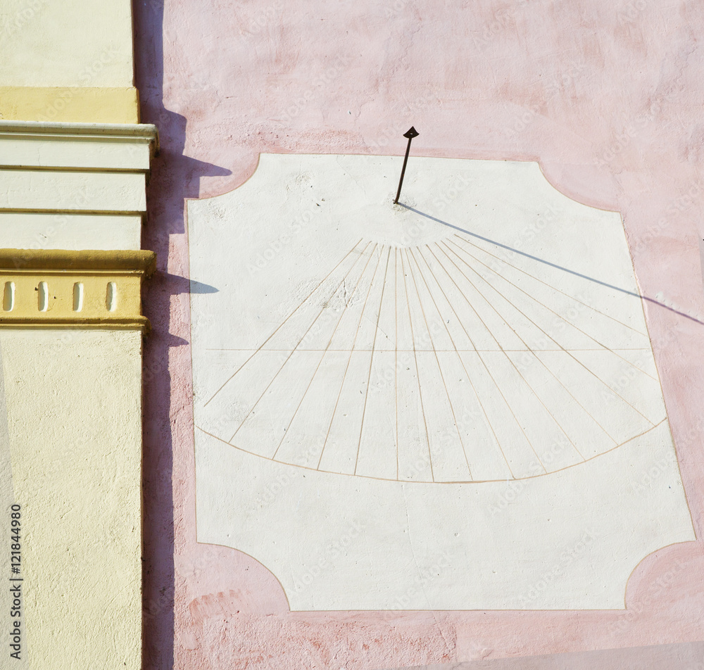 Sundial clock on the wall Stock Photo | Adobe Stock