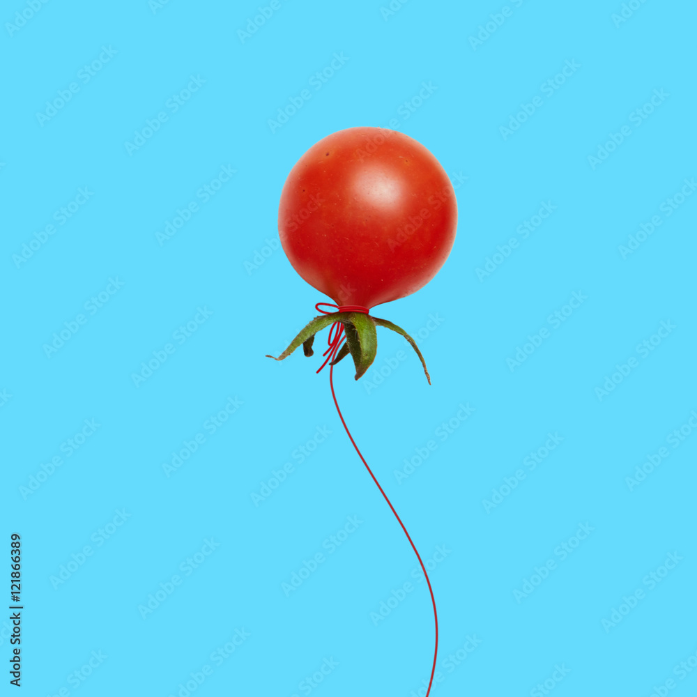 red tomato balloon flying Stock Photo | Adobe Stock