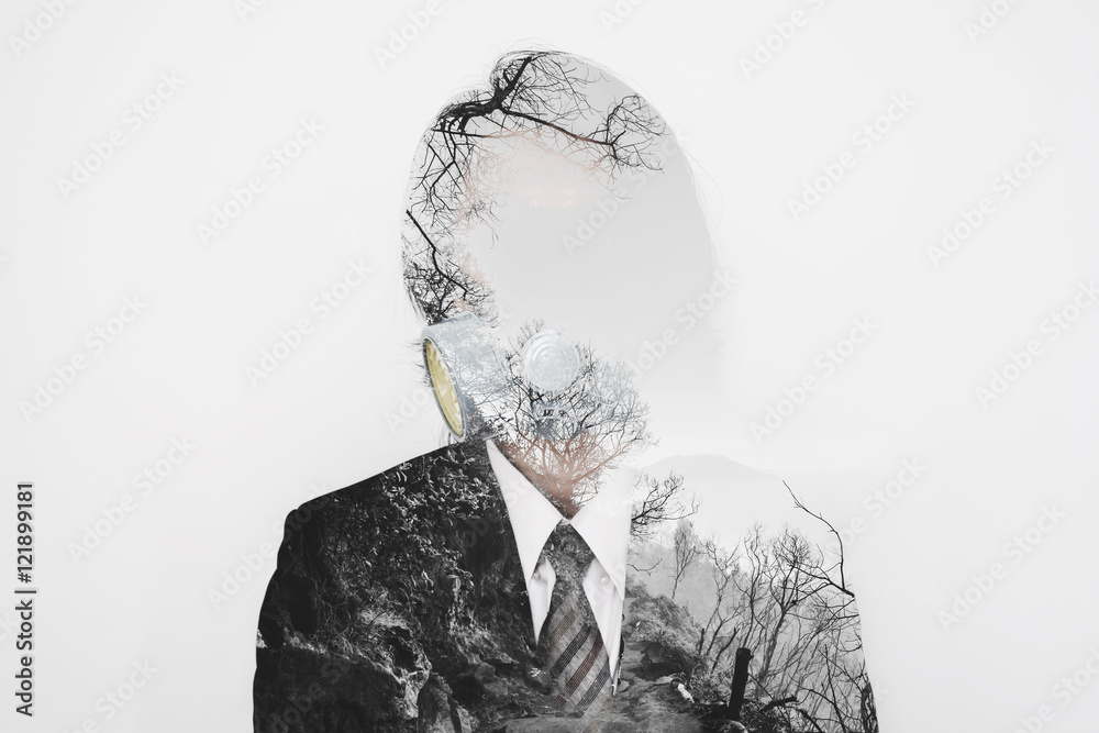 Double exposure, businessman wearing toxic protection mask with dead ...