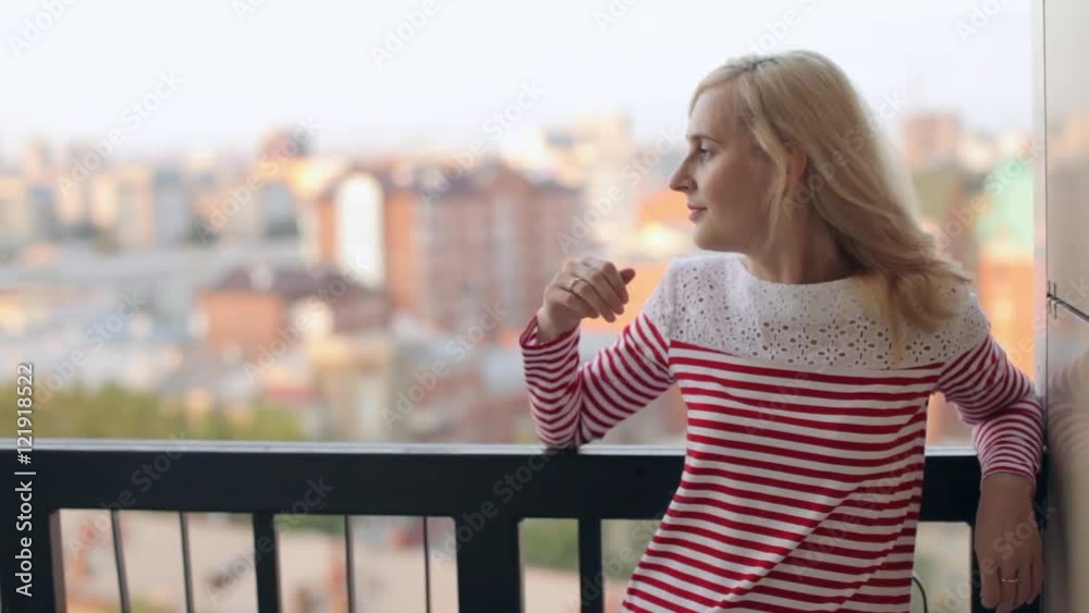 Woman Standing on the Balcony Overlooking the City Stock Video | Adobe ...