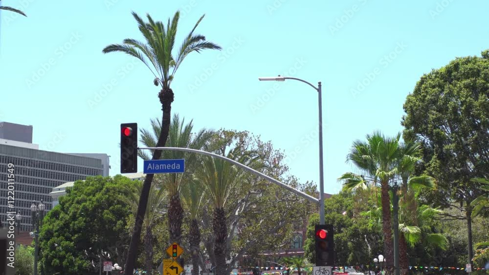 Alameda street sign in downtown Los Angeles, traffic light and palm ...