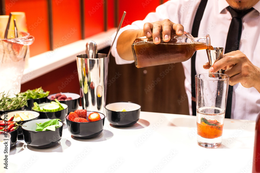 Barman making cocktail Stock Photo | Adobe Stock