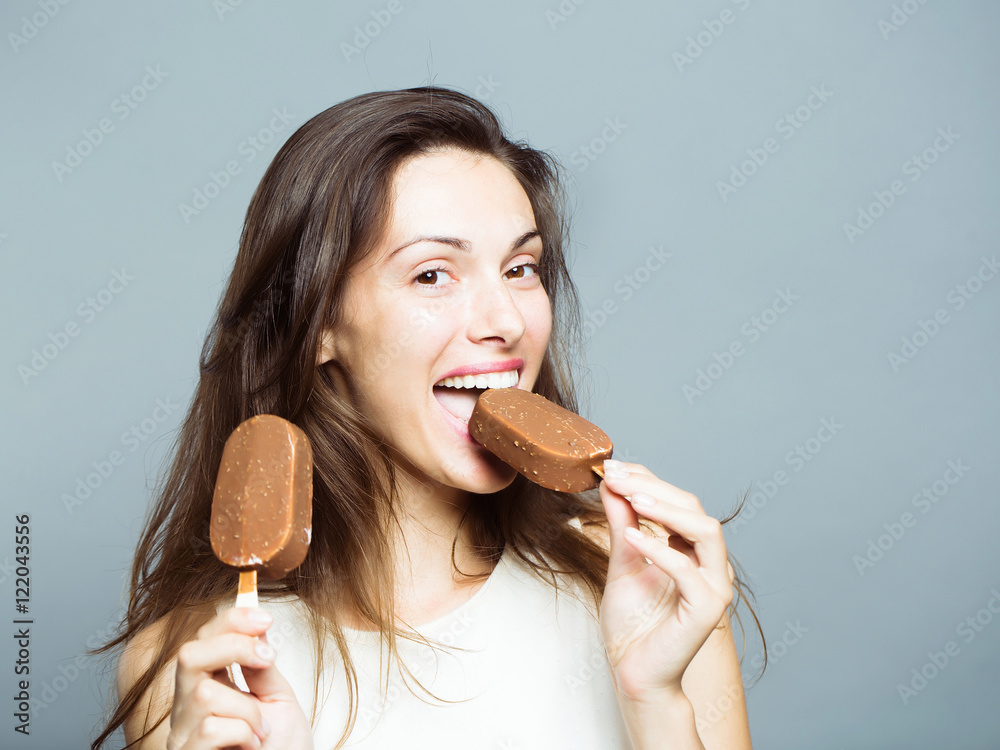pretty girl eating ice lolly Stock Photo | Adobe Stock