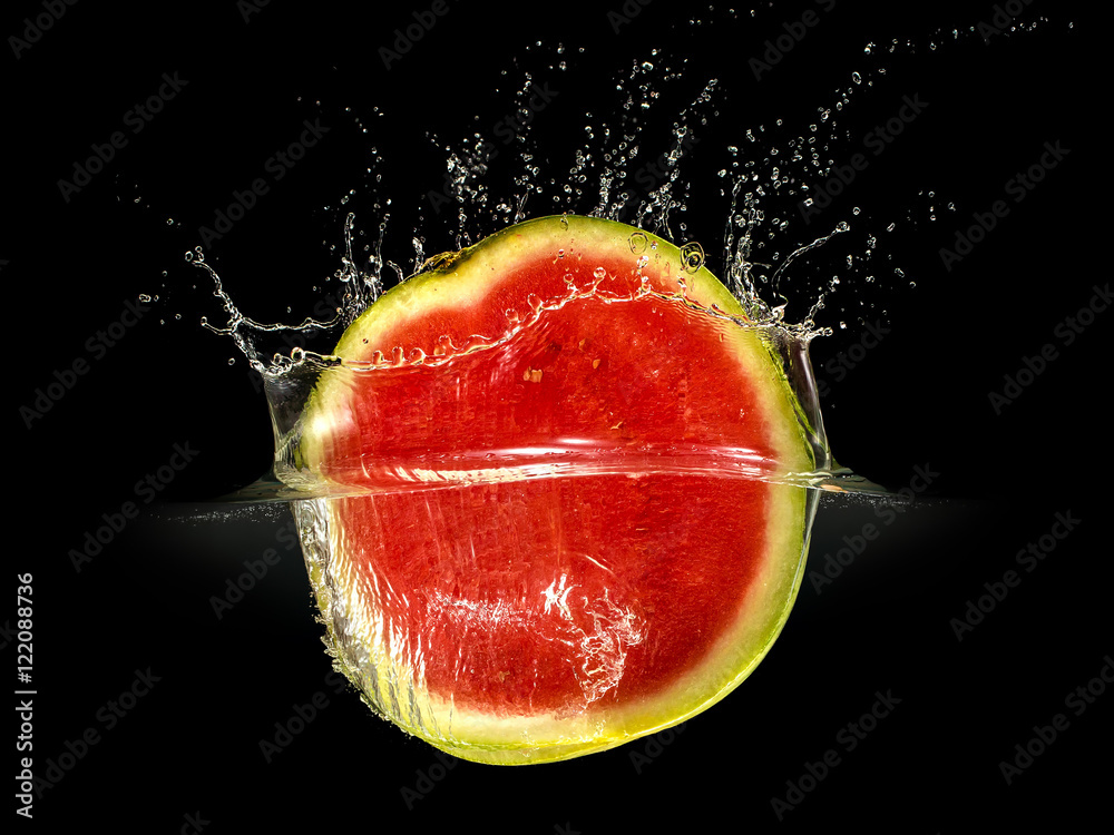 Fresh melon falling in water with splash on black background Stock ...