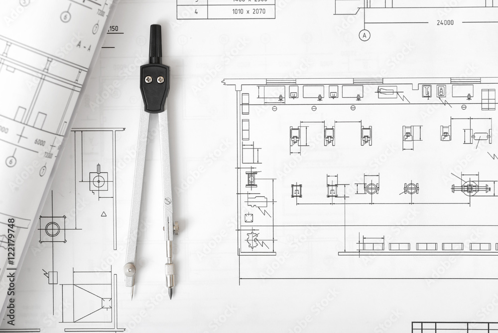 Engineering compass is on building plan. Stock Photo | Adobe Stock