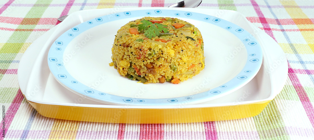 Indian vegetarian food, aval upma, also known as poha upma, made from ...