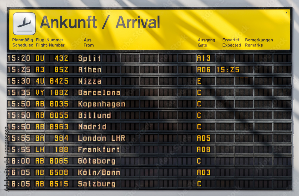 Airport timetable showing arrival times in Berlin. Worldwide arrivals ...