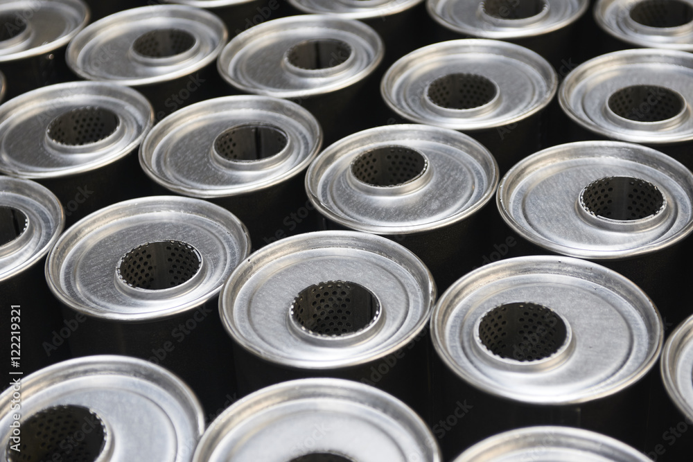 Industrial background. Stacks of new exhausts and silencers mufflers ...