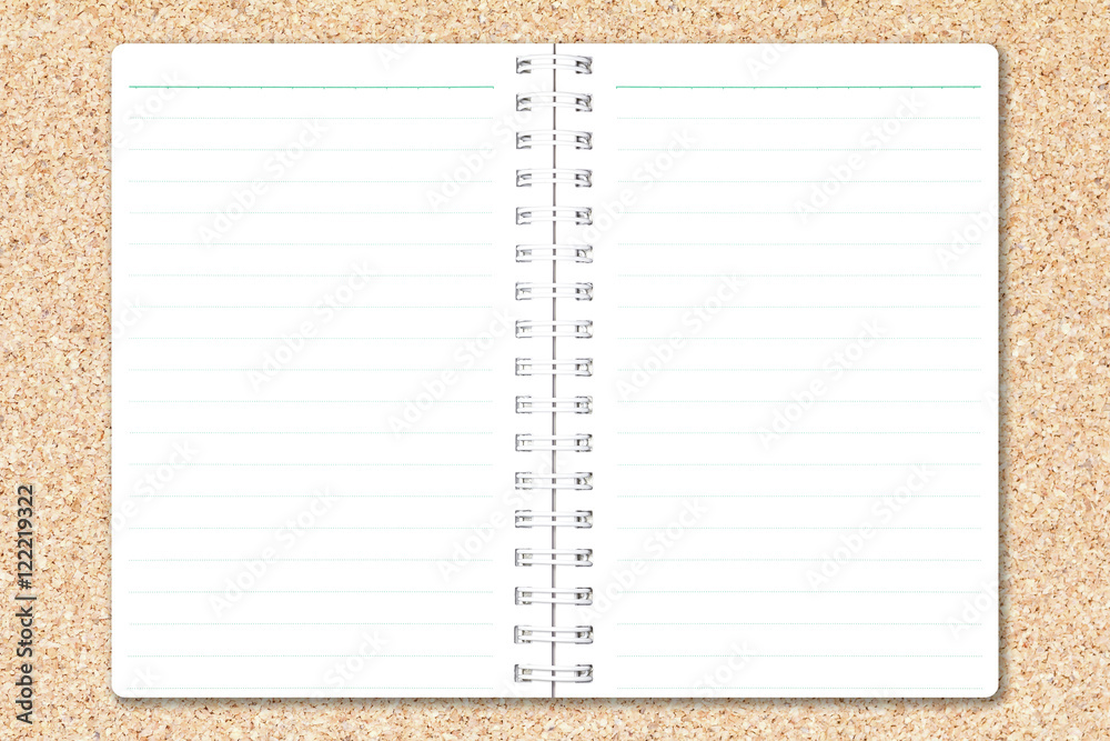 Open notebook paper with line on cork board background for design with ...