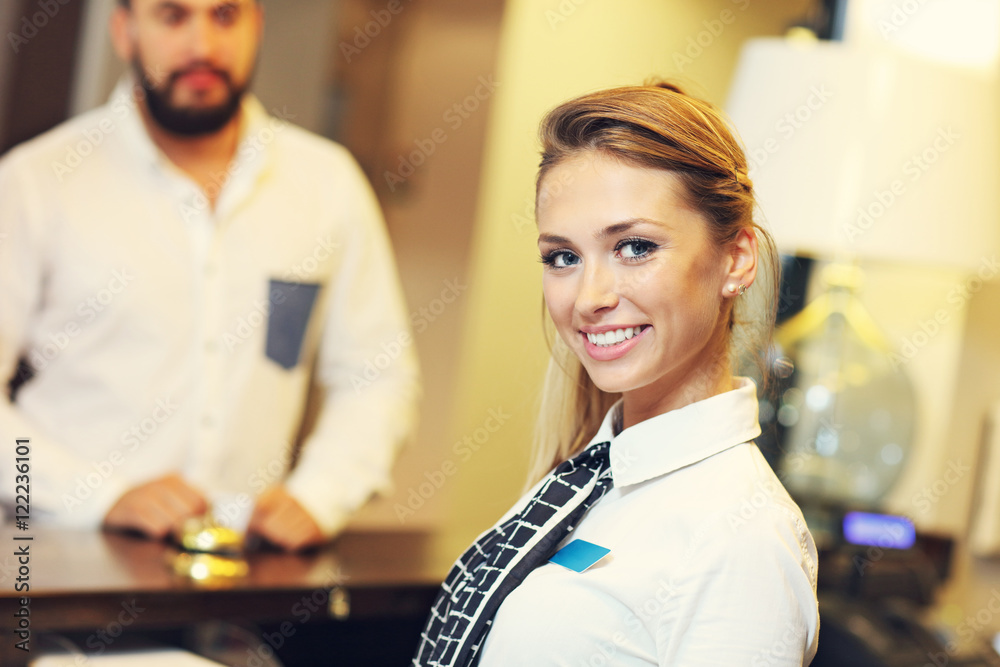 Pretty receptionist Stock Photo | Adobe Stock