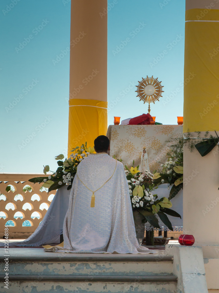 Priest Kneel Down in front of an Altar: Outdoor Church Stock Photo ...