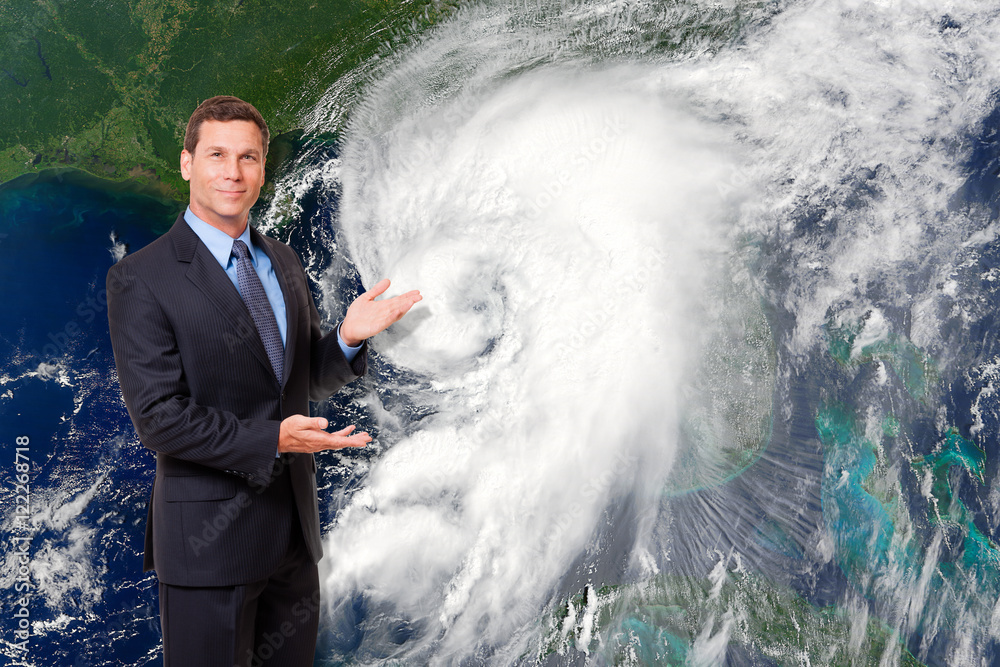 Television meteorologist weatherman forcasting with hurricane typhoon ...