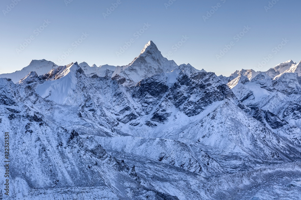 Ama Dablam mountain landscape. Sharp mountain peak standing out among ...