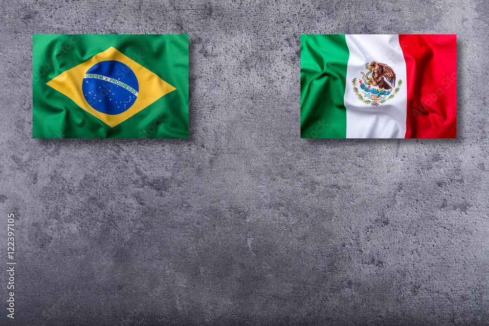 Foto Stock Flag of brazil and mexico on concrete background. | Adobe Stock