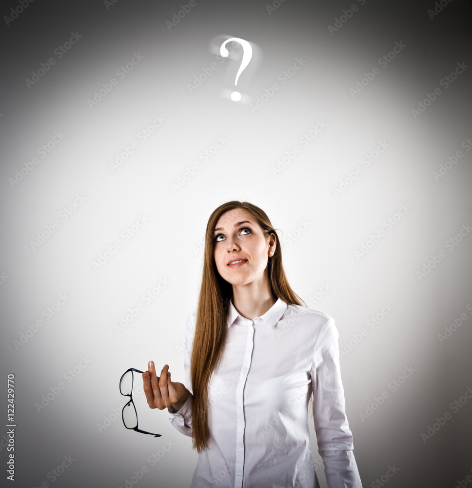 Woman in white and question mark Stock Photo | Adobe Stock