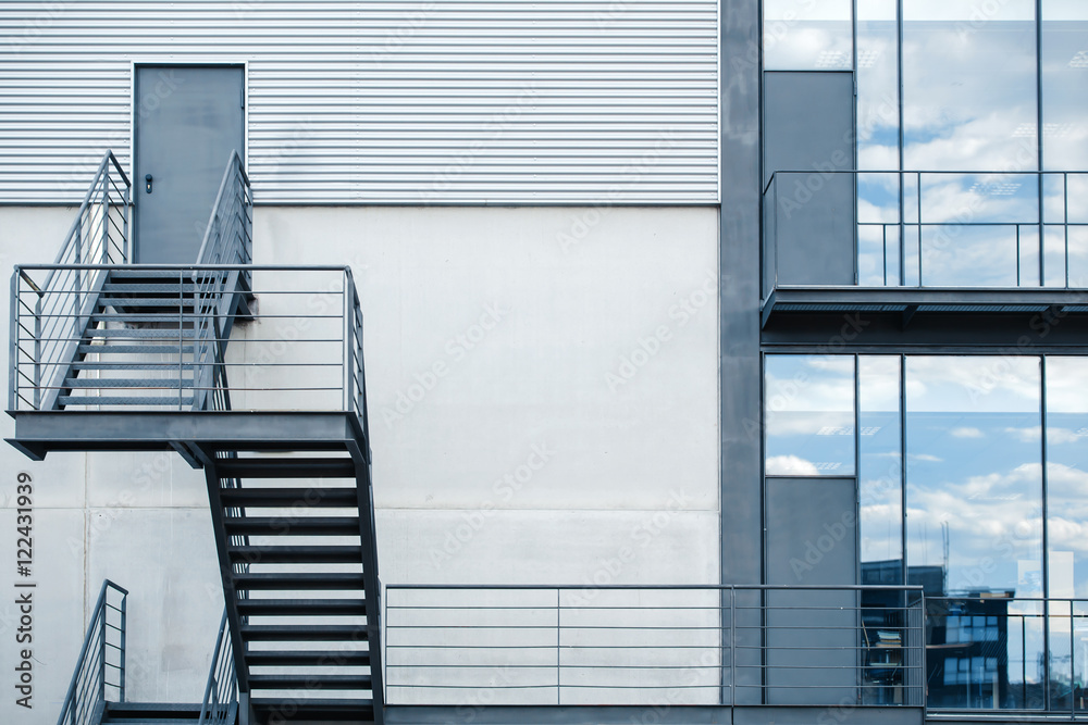 Fire escape staircase in a modern office building / business building ...