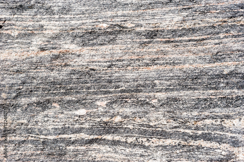 Layered metamorphic rock background texture. Stock-Foto | Adobe Stock