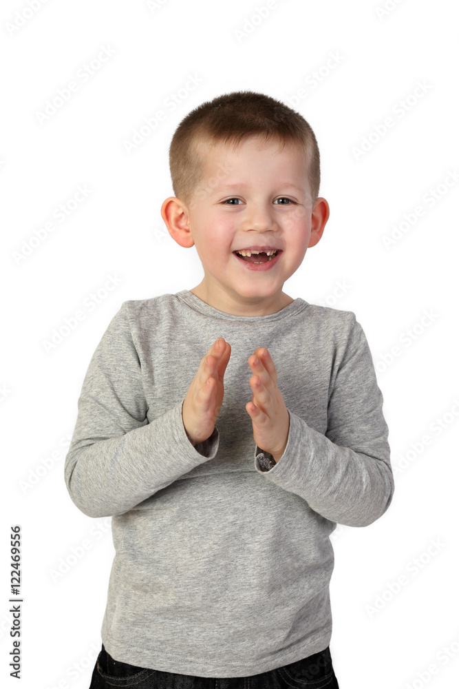 Little toothless boy with wide happy smile on face joyfully clapping ...