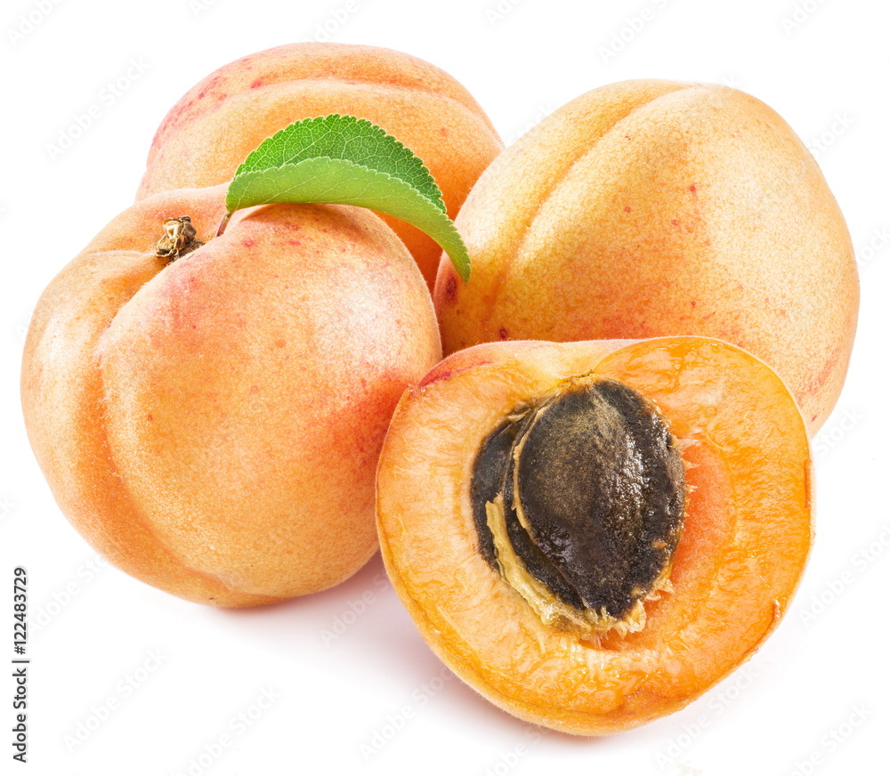 Apricots and its cross-section on the white background. Stock Photo ...