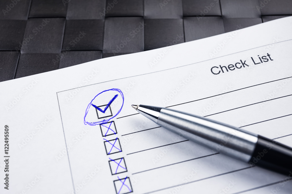 Checklist with a pen with check mark tick on black. Stock Photo | Adobe ...