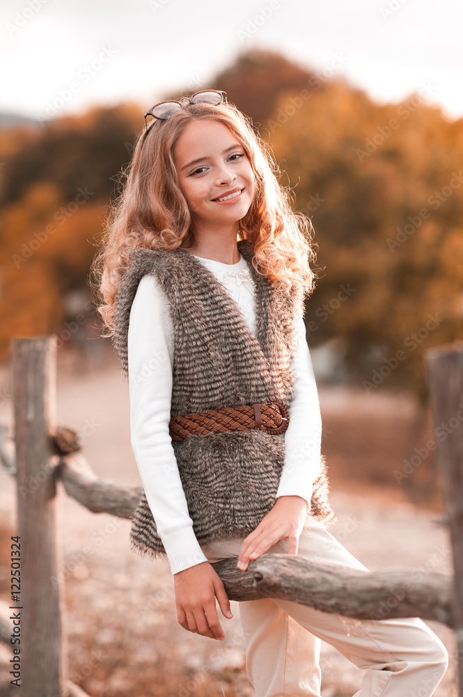 Beautiful Blonde Teenage Girl 13 14 Year Old Wearing Fur Vest White