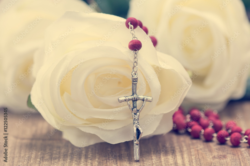 Catholic rosary and white roses Stock Photo | Adobe Stock