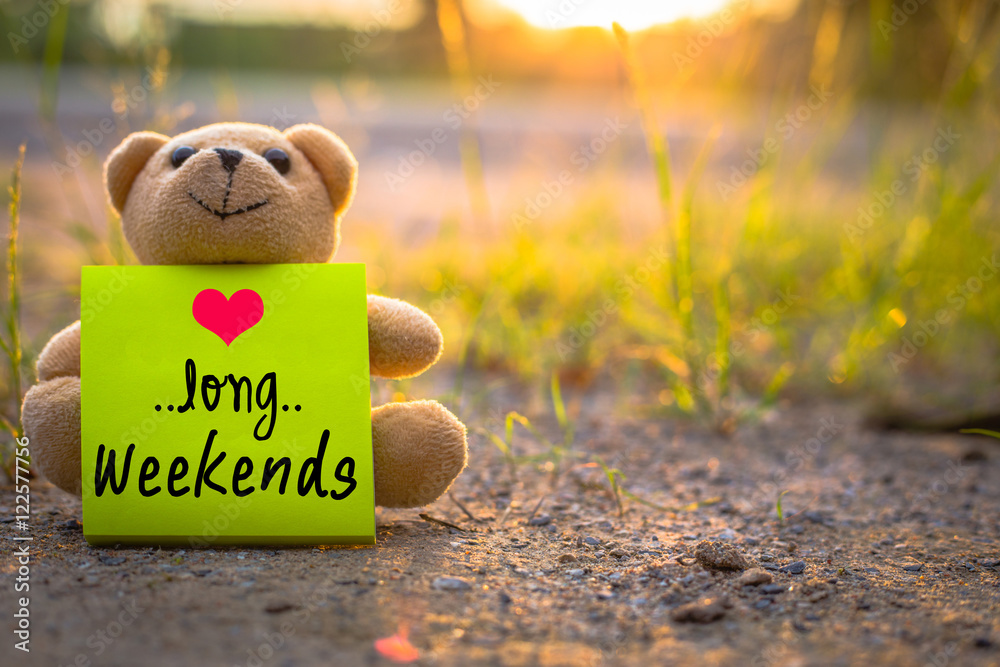 Happy Weekend on sticky note with teddy bear on nature background Stock ...