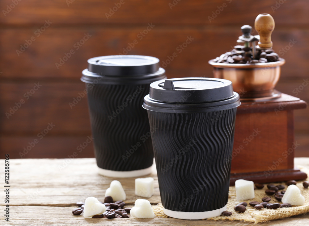 paper cup with hot coffee and coffee beans Stock Photo | Adobe Stock