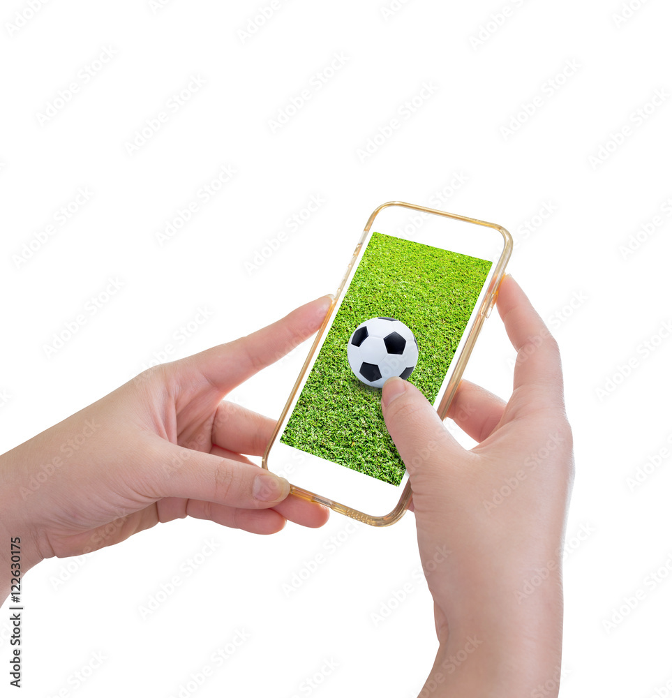 Hand holding mobile phone with soccer ball isolated on white background ...