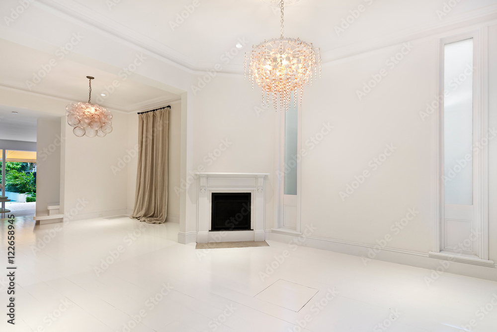 very beautiful white, empty room with a crystal chandelier Stock Photo ...
