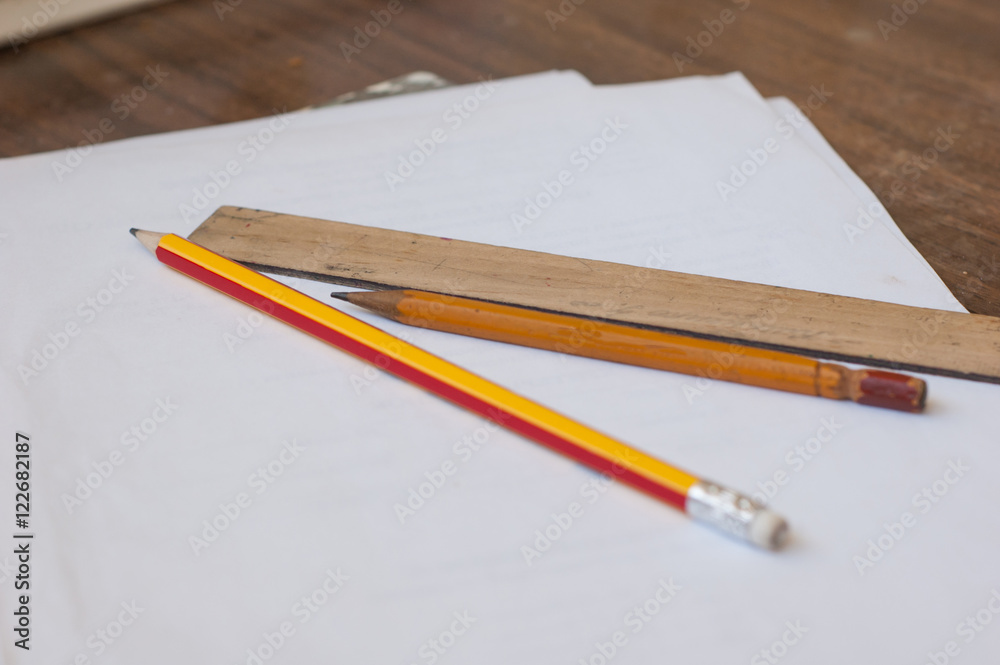 Pencil, ruler and paper on the table. Stock Photo | Adobe Stock