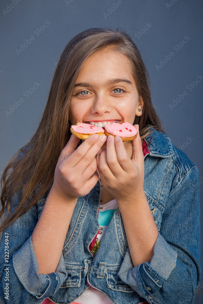 Girl eating cookies, snack for teenagers in school time. sweets and ...