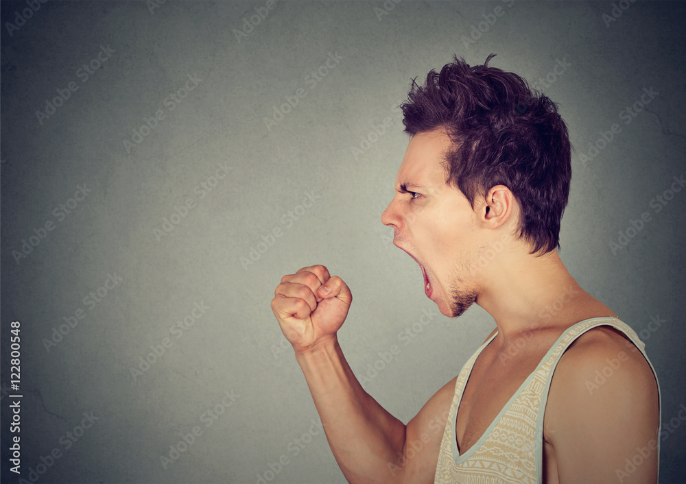 Side profile portrait of young angry man screaming Stock Photo | Adobe ...