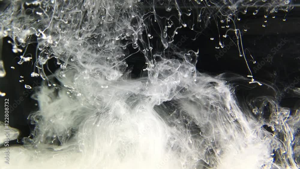White Ink Effect In Water Filmed On Black Background. Abstract ink ...
