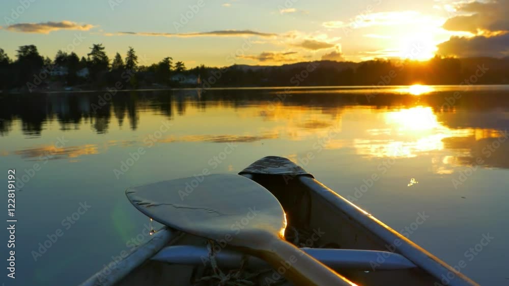 4K Canoe on Lake, Nature Adventure, Dusk Sunset on Still Ocean Water ...