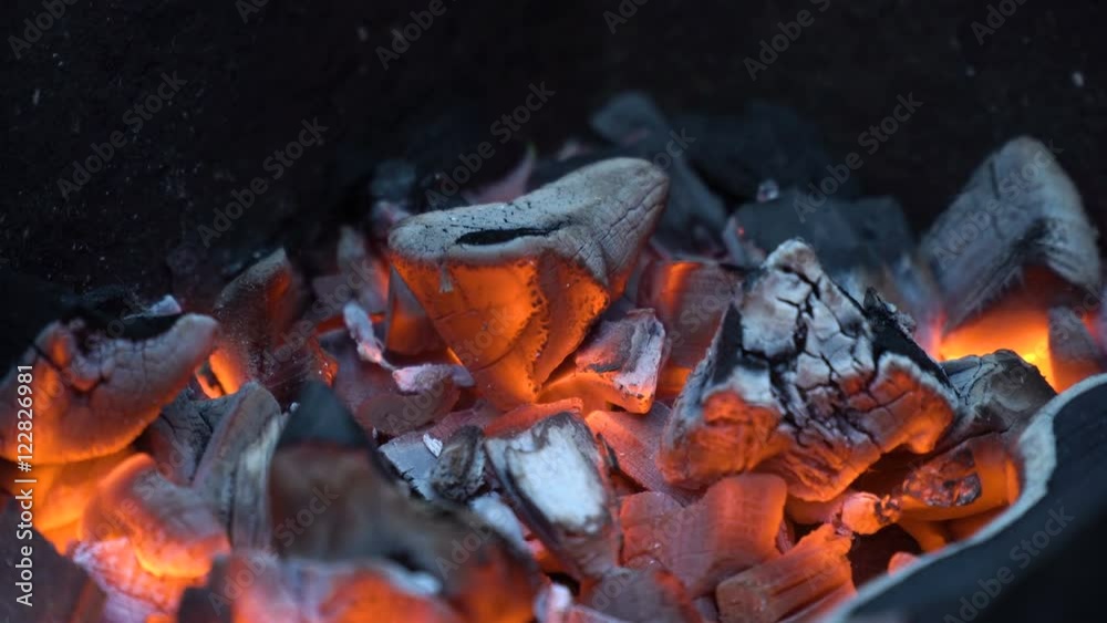 Burning charcoal.Hot coals in the fire.Fire woods and hot coal in a ...