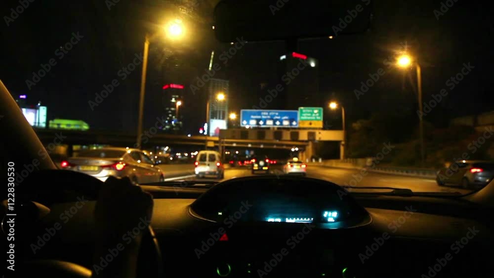 Cars driving on the road at night. The view from the vehicle cab. Stock ...