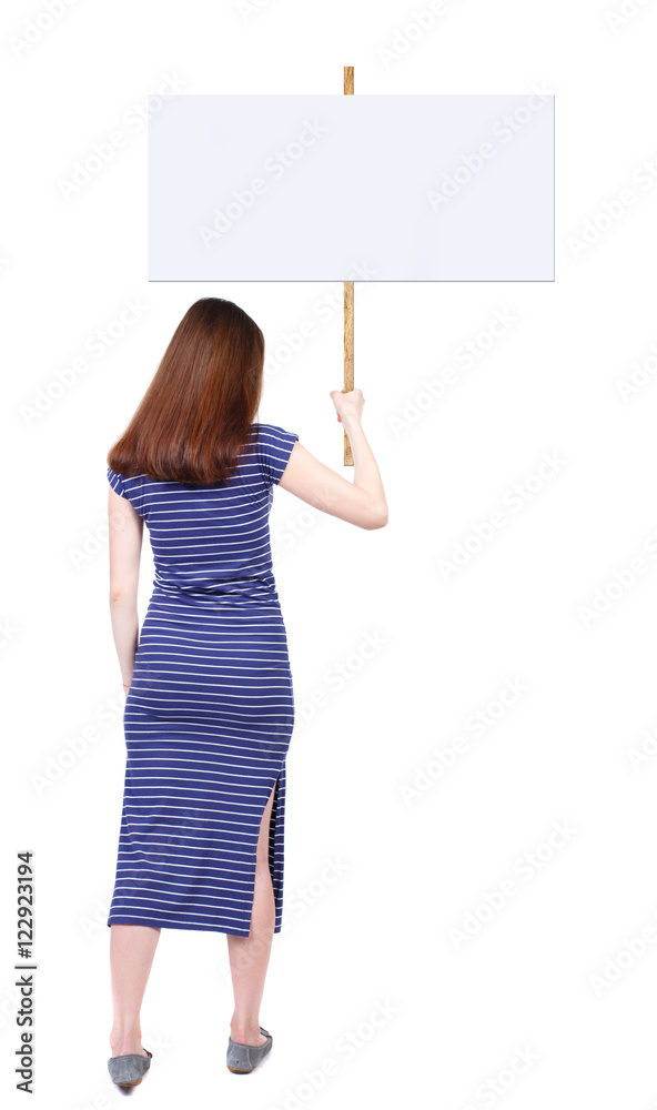 Back view woman showing sign board. man holds information plate. Rear ...