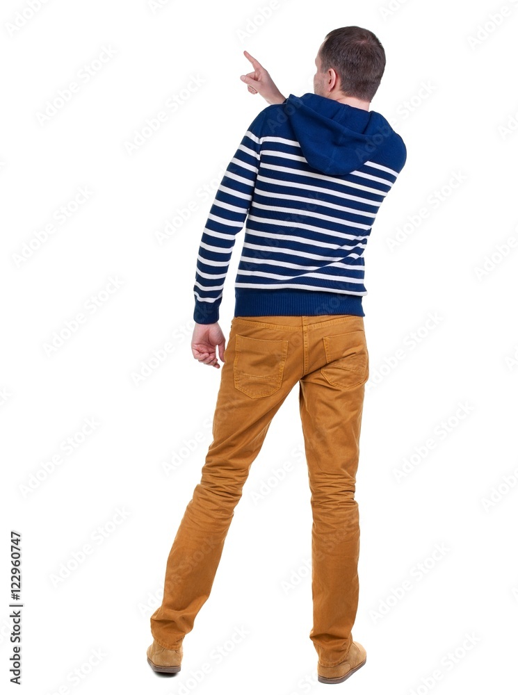 Back view of pointing young men in hooded sweater. Young guy gesture ...
