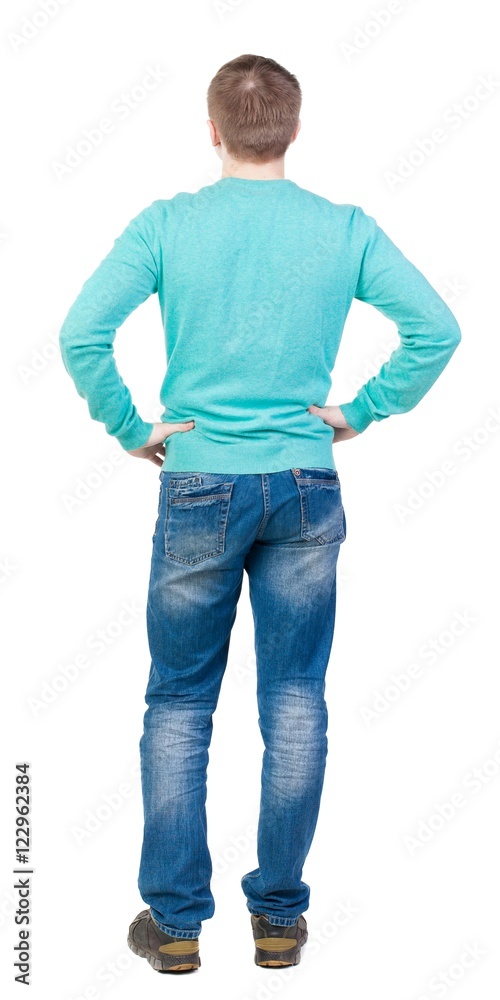 Back view of man in jeans. Standing young guy. Rear view people ...