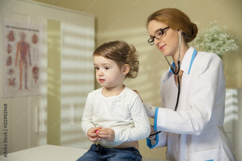Cute little girl and doctor. Pediatrician woman examining cute little ...