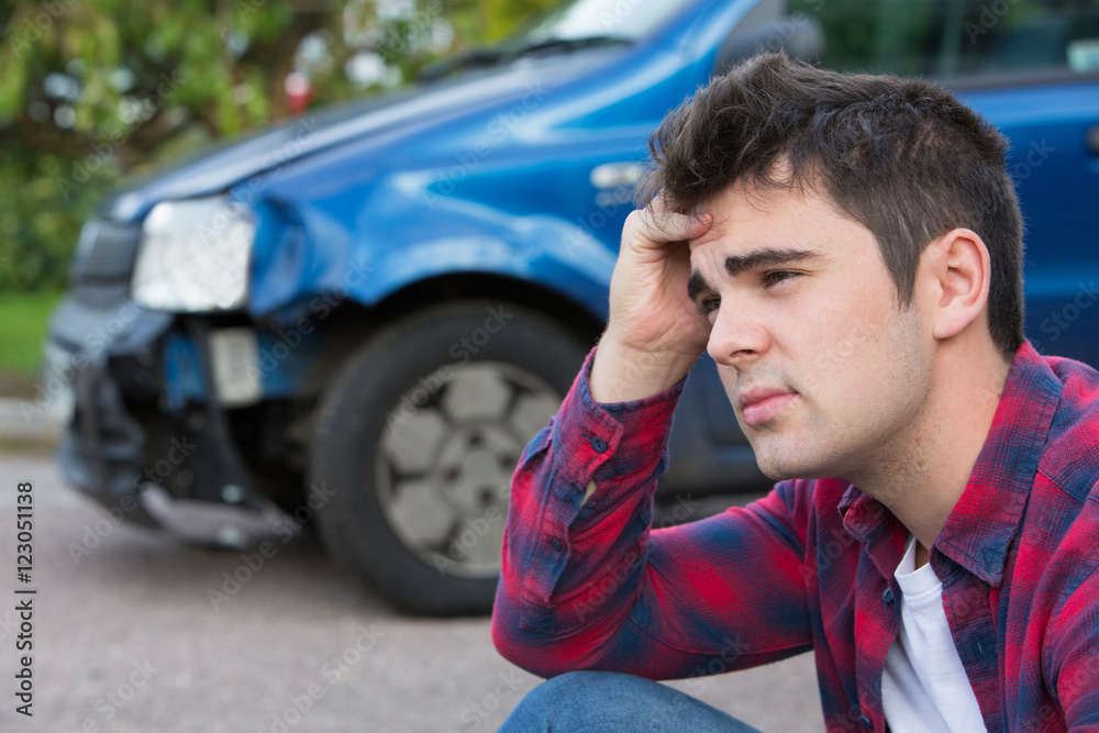 Unhappy Driver With Damaged Car After Accident Stock-Foto | Adobe Stock