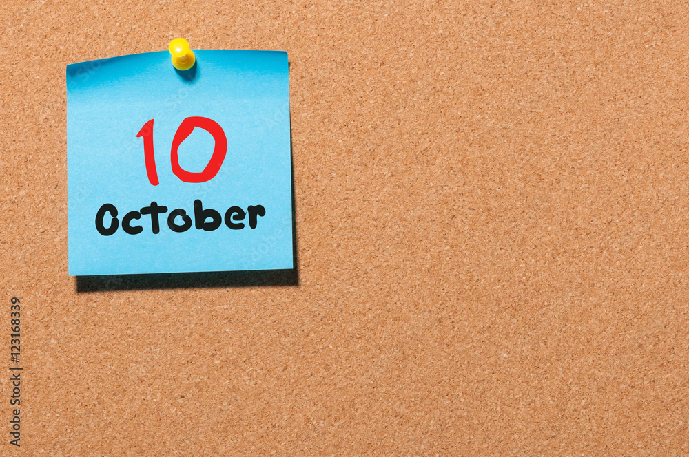 October 10th. Day 10 of month, color sticker calendar on notice board ...