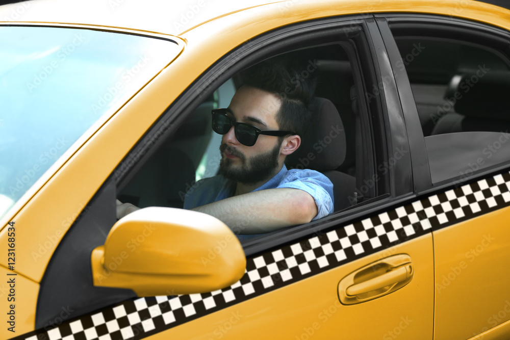 Young man sitting in taxi car, close up view Stock Photo | Adobe Stock