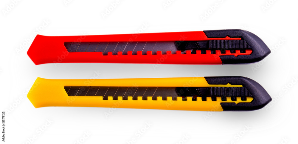 Yellow and red paper cutters with closed blade Stock Photo | Adobe Stock