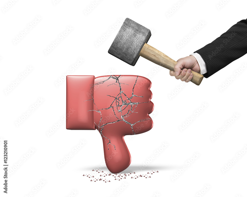 Hand holding hammer hitting red thumb down with cracks Stock Photo ...