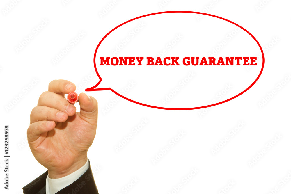 Hand writing "Money back guarantee" with a marker on a transparent wipe ...